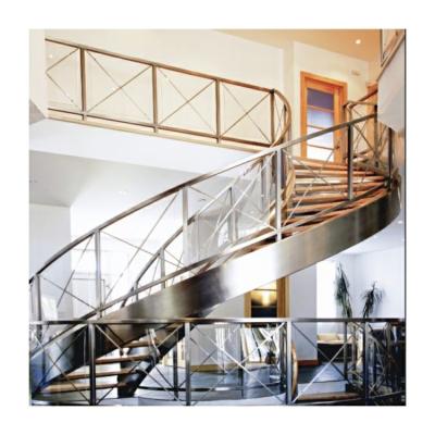 China Solid wood tread curved staircase with wrought iron spindles Canada curved iron stairway for sale