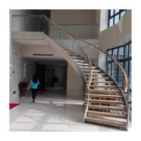 China Timber tread round staircase price Calgary curved stairway lift cost for sale