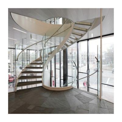 China Solid wood treads round stair case design Angola curved stairway plan for sale