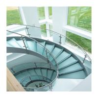 China Unique Multilayer glass curved staircase brass spindles stairway design curved for sale