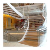 China Timber wooden step curved steel staircase design Tanzania curved basement stairway for sale