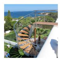 China Solid wood treads building curved stairs Faroe Islands grand curved stairway for sale