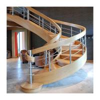China Solid wooden tread curved steel staircase Singapore used curved stairway lift for sale