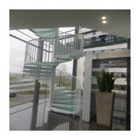 China 2023 Glass Treads Spiral Stair Steel Post Stringer Helix Staircase for sale