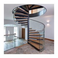 China Residential thick wooden steps stairs kempas spiral staircase for sale