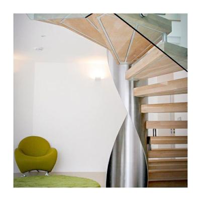 China Customized elegant wood stairs modern residential spiral staircase for sale