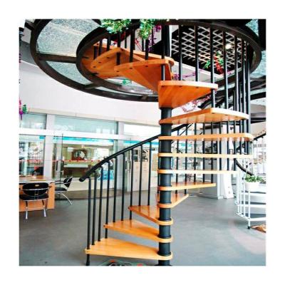 China Handrial bracket spiral staircase with wooden tread tempered glass tread spiral stairs for sale
