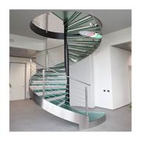 China Townhouse steel staircase glass steps spiral stairs for sale