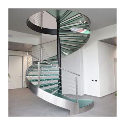 China Townhouse steel staircase glass steps spiral stairs for sale