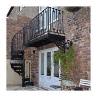 China Metal stair grills carbon steel stair tread indoor wrought iron spiral staircase for sale