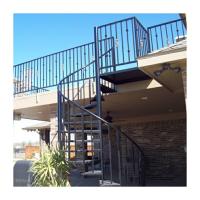 China Outdoor iron railing designs stainless steel stair steps indoor metal spiral staircase for sale