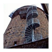 China Modern curved steel stair cast iron rotary staircase spiral stairs metal for sale