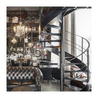 China Modern curved steel stair cast iron rotary staircase spiral stairs metal for sale