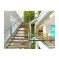 China Complete style straight stairs prefab solid wood tread glass railing stairs for sale