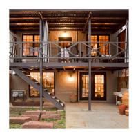 China Luxury residential stairs indoor carbon steel structure mild steel central stringer staircase for sale