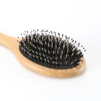 China Laser Vent Wide Tooth Boar Bristle Hair Comb Wooden Anti Static Hair Brush For Women for sale