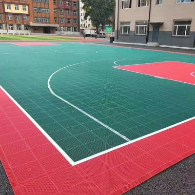 China Outdoor PP Tiles Sports Flooring with 30.48cm Size 1.58cm Thickness and Water Drainage Design for sale