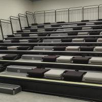 China PP Material Retractable Bleacher Seating with Sofa Cushion and Rear Folding Design for Studio Meeting Room for sale