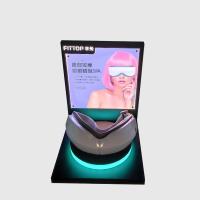 China Acrylic Countertop LED Display Stand for Neck Massager, Custom Brand POS Retail Display Rack with Screen Player for Electronic Product Promotion for sale