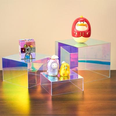 China Custom Colorful Acrylic 5-Sided Cross-Border Display Box with Hollow Base, for Perfume, Figurines and Dessert Display for sale