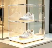 China Custom LED Lighted Acrylic Shoe Display Case With Adjustable Leveling Feet for sale
