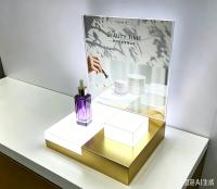 China L-shaped product display stand, transparent acrylic cosmetic display rack with lights, skin care product shelf for sale