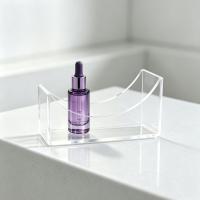 China Clear Acrylic Curved Display Stand, Transparent U-Shape Acrylic Product Holder for Cosmetic & Bottle Display for sale