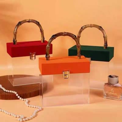 China Luxury Clear Acrylic Gift Box with Bamboo Handle, Velvet Top Hinged Handbag Style Gift Case, Custom Eid Ramadan Wedding Favor Perfume Packaging Box Wholesale for sale