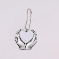China Creative Christmas Ornament Heart In Hands Sublimation Car Charm Pendants Blanks For Heat Press for sale