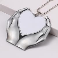 China Creative Christmas Ornament Heart In Hands Sublimation Car Charm Pendants Blanks For Heat Press for sale