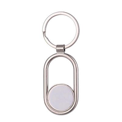 China Sublimation Blank Metal Key Holder Movable Core double sided personalized keychain for sale