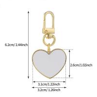 China Promotion Gift Heart Keychains Gold Sublimation Metal Charm Heart Keychains for sale