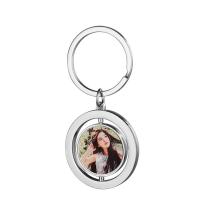 China Personalized Rotary Photo Keychain Double Sided 360 Rotating Sublimation Blanks Metal Key Chain  Keyring for sale