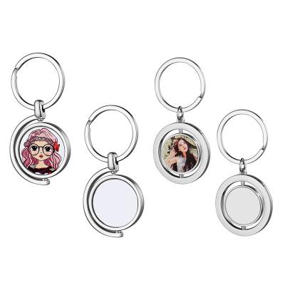 China Personalized Rotary Photo Keychain Double Sided 360 Rotating Sublimation Blanks Metal Key Chain  Keyring for sale