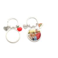 China Promotional Birthday Gift Keychain Round Metal Pendant Keychain Unique Sublimation Blank Photo Keychain for sale