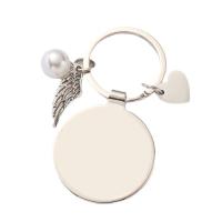 China Promotional Birthday Gift Keychain Round Metal Pendant Keychain Unique Sublimation Blank Photo Keychain for sale