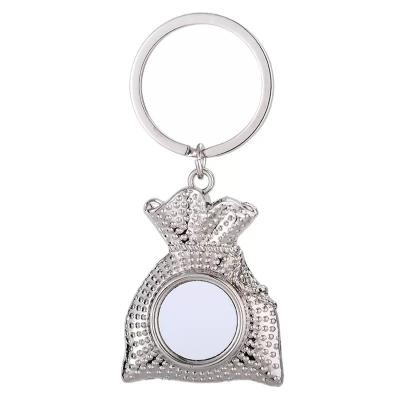 China Custom Logo Keychains DIY Creative Sublimation Gift Bag Keychain Pendant Heat Transfer Metal Blank Round Photo Keyring for sale