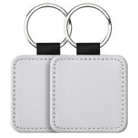 China Custom Leather Keychain Printable Double Sided Sublimation Leather Keychain Blanks for sale