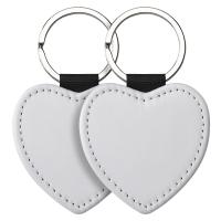 China Custom Leather Keychain Printable Double Sided Sublimation Leather Keychain Blanks for sale