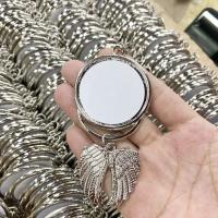 China Custom Metal Car Hanging Ornaments Sublimation Double Sided Photo DIY Angel Wings Car Interior Ornaments for sale