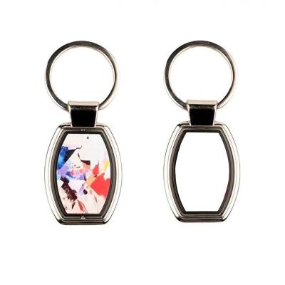 China Sublimation Rotary Keychain Business Gift Custom Logo Double Sided Sublimation Keychain Blanks Metal Keyring Blanks for sale
