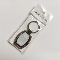 China Sublimation Rotary Keychain Business Gift Custom Logo Double Sided Sublimation Keychain Blanks Metal Keyring Blanks for sale