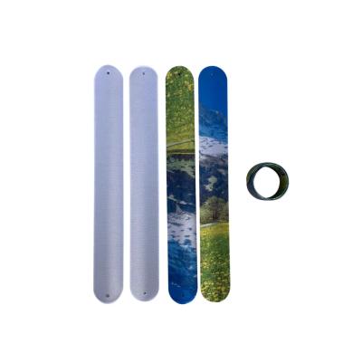 China Promotional Gift Double Sided Sublimation Popping Circle DIY Steel Plate Curved Wristband for sale