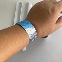 China Promotional Gift Double Sided Sublimation Popping Circle DIY Steel Plate Curved Wristband for sale