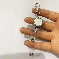China Anti-Loss Sublimation Blank Metal Retractable Keychain Diy Custom ID Badge Holder With Telescopic Rope for sale