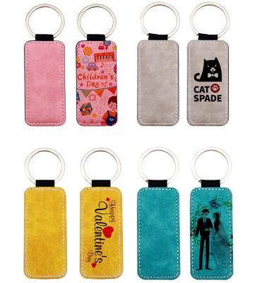 China Waterproof Double Sided Rectangle Sublimation Leather Keychain Blanks for sale