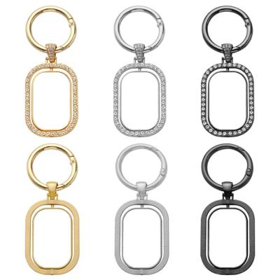 China Double-Sided Blank Sublimation Rotary Keychain With Rhinestone Rectangle Metal Key Rings Gold Silver Black Keychains for sale