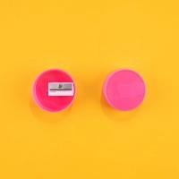 China Diy Photo Printing 40MM Plastic Round Handheld Pencil Sharpener Sublimation Blank Manual Pencil Sharpener for sale