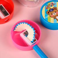 China Diy Photo Printing 40MM Plastic Round Handheld Pencil Sharpener Sublimation Blank Manual Pencil Sharpener for sale
