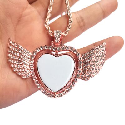 China Rotary Angel Wing Sublimation Necklace Photo Printing Sublimation Wing Necklace Round And Heart Shape for sale